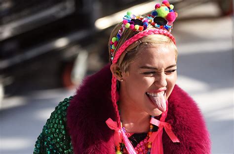 Miley Cyrus Tears Apart A Teddy Bear Goes Topless In New Commercial