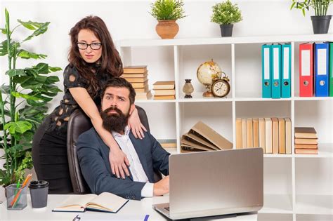Premium Photo Acting On Her Feelings Female Boss Flirting With Male