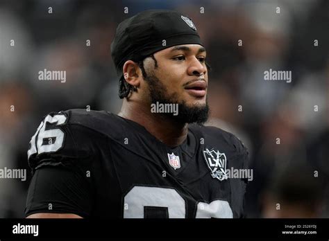 Las Vegas Raiders Defensive Tackle Jonah Laulu 96 Stands On The Field