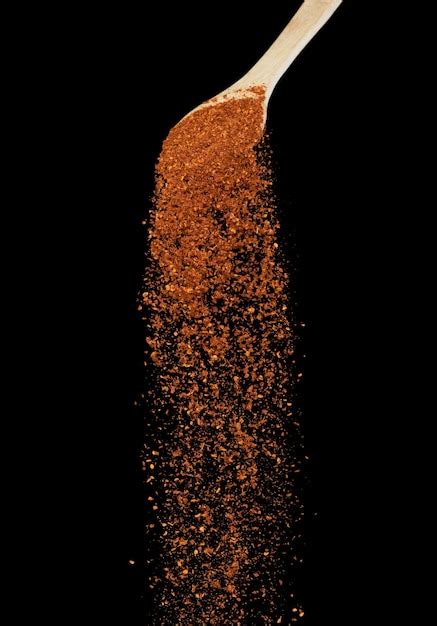 Premium Photo Red Hot Chilli Flying Explosion Red Grain Chilli Explode Abstract Cloud Fly Seed