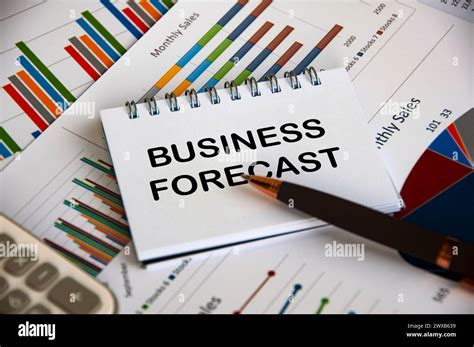 Business Forecast Text On Notepad With Business Analysis Background