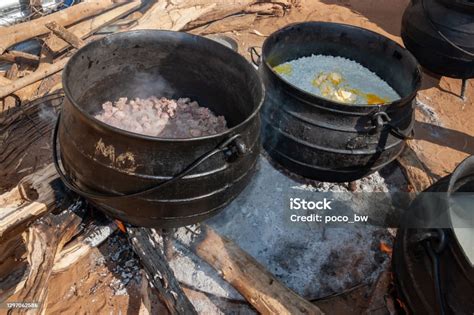 Outdoors African Cooking In The Kitchen With Three Legged Pots Stock