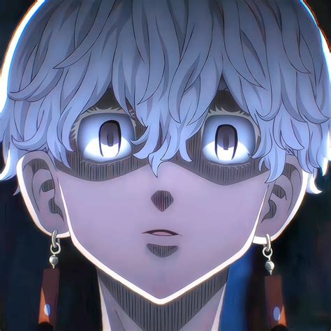 An Anime Character With White Hair And Blue Eyes Looks At The Camera While Wearing Earrings