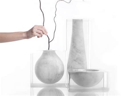 Moreno Ratti Suspends Marble Volumes Inside Resin Cubes