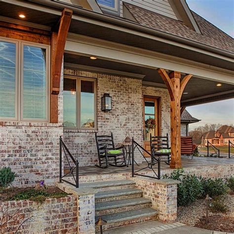 Our Work — Holmes By Design Brick Exterior House Ranch House