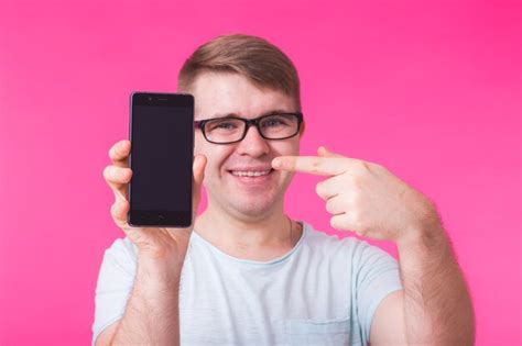 Premium Photo Man Showing Blank Screen Mobile Phone