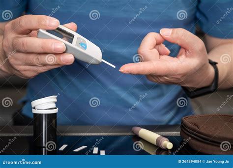 Man Measures His Blood Sugar Glucometer Blood Sample Test Diabetes