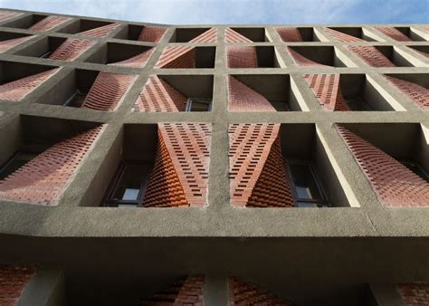 Perforated Brick Screens Act As Curtains For Tehran Housing