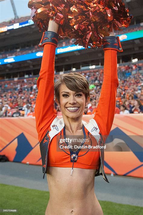 A Denver Broncos Cheerleader Performs During A Preseason Nfl Game