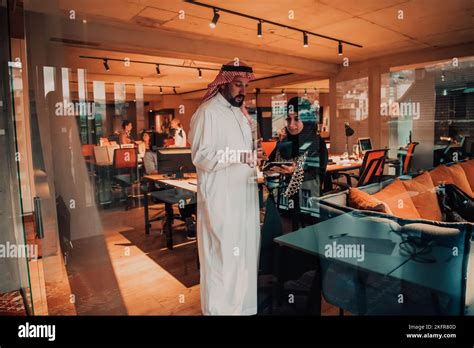 Portrait Photo Of Arab Leader Businessman With Muslim Hijab Woman