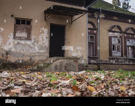 Old Building In Park At The Fall Time Rustic And Falling Apart From