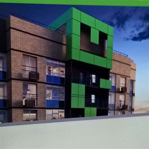 Minecraft Building Green Structure With Windows And Balconies