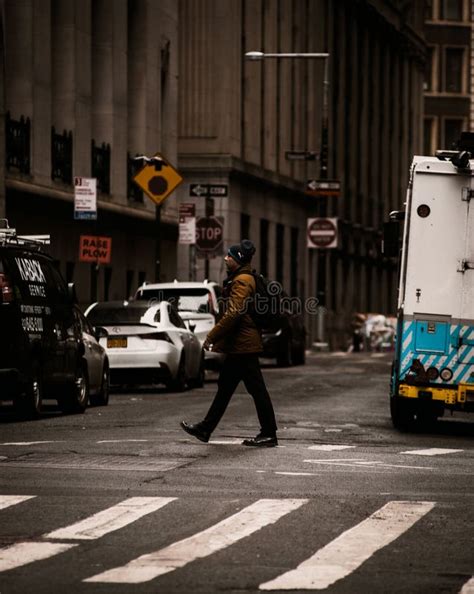 Vertical Shot Of A Man Crossing The Street At Crosswalk Editorial Stock Image Image Of