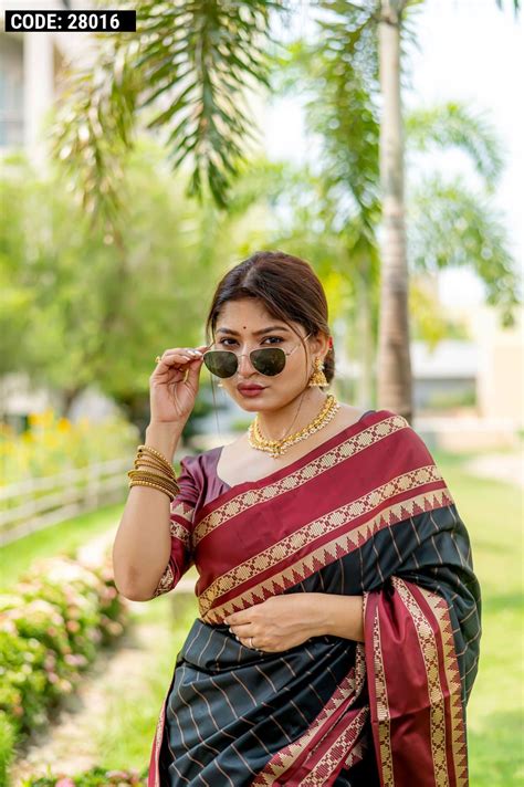 Black Color Soft Raw Silk Saree With Woven Design