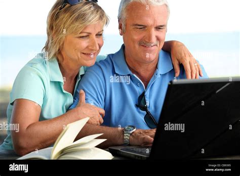 Couple Sending E Mail Stock Photo Alamy