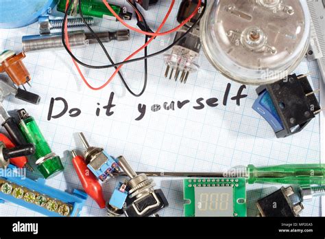 Do It Yourself Radio Electronic Parts On Graph Paper Background Stock Photo Alamy
