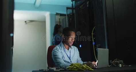Technician Laptop Or People In Server Room Team Or Database Cables Check With Engineering