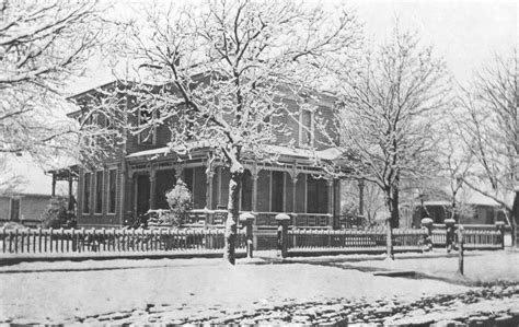 Historic Photo A Photograph Of A Snowy Two Story House In Grand