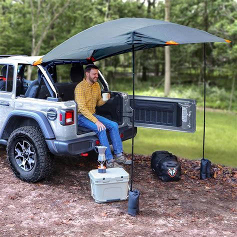 This Canopy Turns Your Hatchback Or Suvs Liftgate Into A Rain And Sun