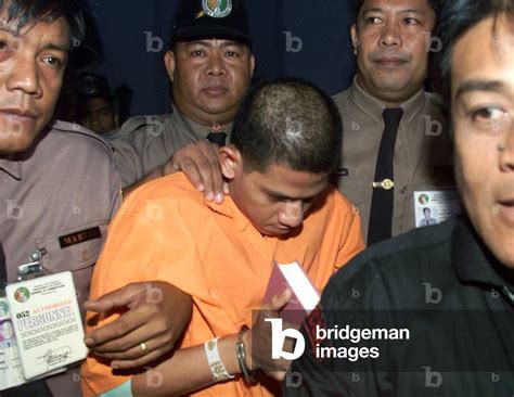 Image Of Filipino Rapist Killer Pablito Andan Grasps A Holy Bible In