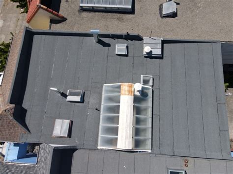 The Ultimate Guide To Flat Roof Replacement Everything You Need To Know Apollo Roofing Company