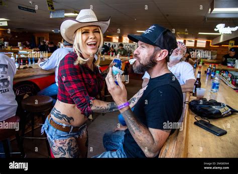 A Bar Patron Receives A Jello Shot With Whipped Cream At One Eyed Jacks