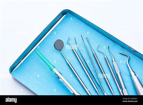 Set Of Dental Tools Equipment And Tooth Extraction Instruments On A