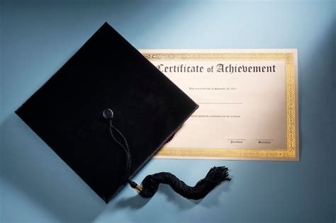 Premium Photo Close Up Of Certificate And Mortar Board