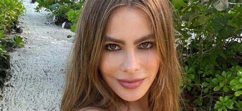 Sofia Vergara Suns Her Buns In Poolside G String