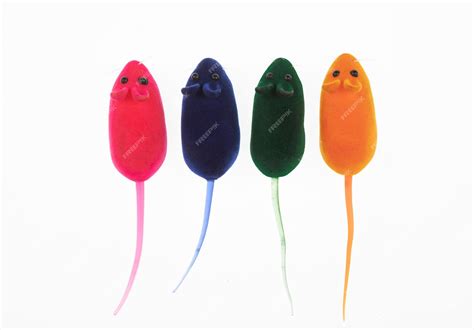 Premium Photo Four Colorful Mice With Faces On Their Heads Against A