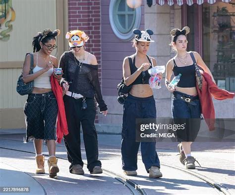 Members Of Girl Group Kateye Are Seen Strolling Through Disneyland As