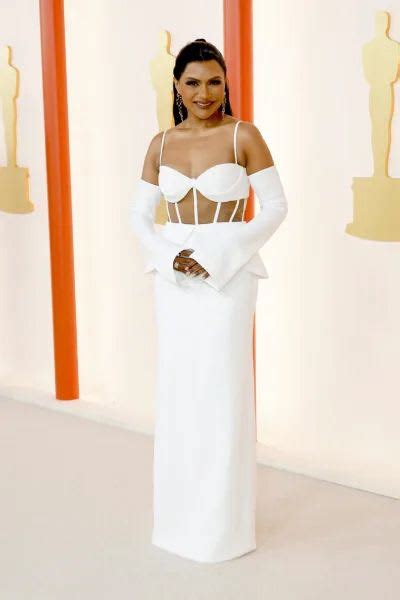 Mindy Kaling Slips Impressive Physique Into Slinky Gown For Oscars