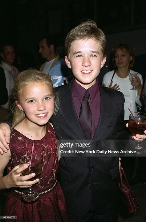Haley Joel Osment And Younger Sister Emily Are Arm In Arm At The