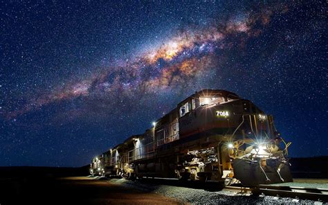 Train Passing In The Night Wallpaper