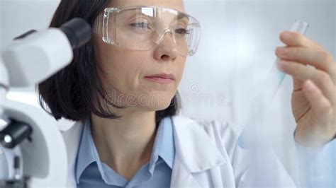 Female Scientist Analyzing Sample In Laboratory Stock Footage Video