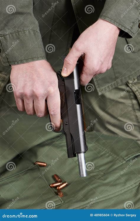Soldier Shutter Cocking Pistol Gun Royalty Free Stock Image 48994504