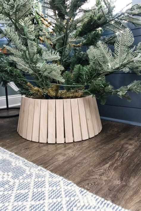 Diy Paint Stick Christmas Tree Collar Using A Laundry Basket Artofit