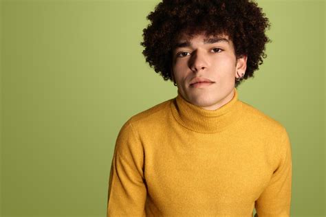 Premium Photo Calm Man In Yellow Pullover
