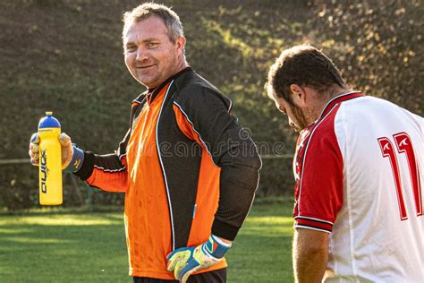 Amateur Soccer Players Taking A Break On Sunny Day Editorial Stock Image Image Of Water