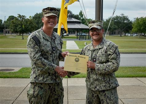 Naval Mobile Construction Battalion Eleven A Seabee Assigned To Naval