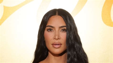 Kim Kardashian Shows Off Her Ultra Tiny Waist In Pink Bikini As She