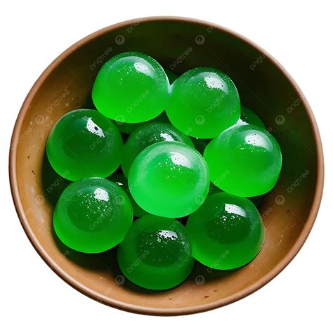 A Bowl Filled With Translucent Green Gelatin Spheres Glistening