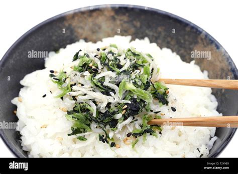 Japanese Shirasu And Takana Vegetable On Cooked White Rice On White