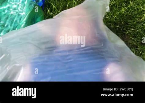 Woman Lying Inside Plastic Bag Stock Videos And Footage Hd And 4k Video Clips Alamy
