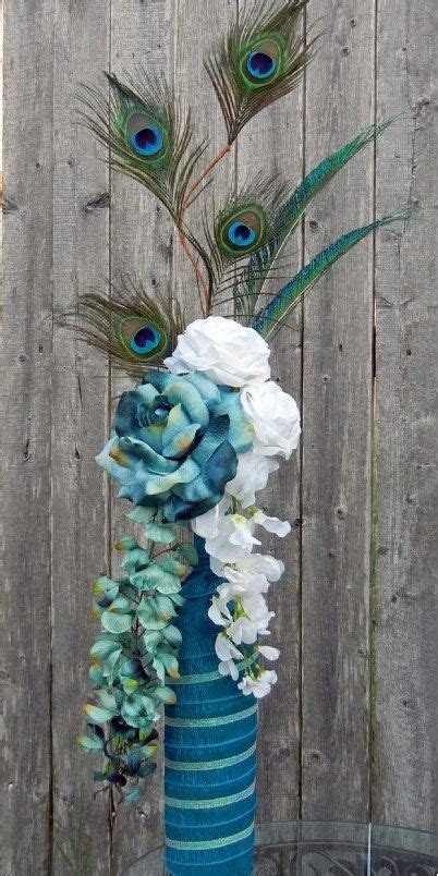 Peacock Feather And Floral Arrangement