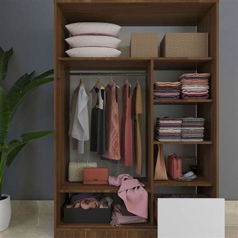 دولاب مكون من ارفف و ادرج مع علاقة ملابس أركان القصر