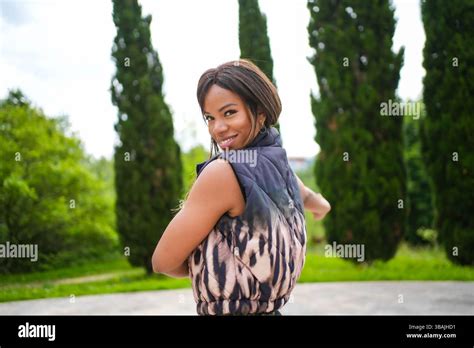 Cute Female Latin Sensual Beauty Dancer Turning To Smile At Camera