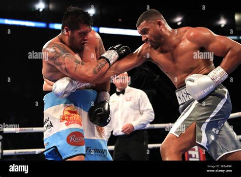 Solomon Dacres Right In Action Against Ariel Esteban Bracamonte In