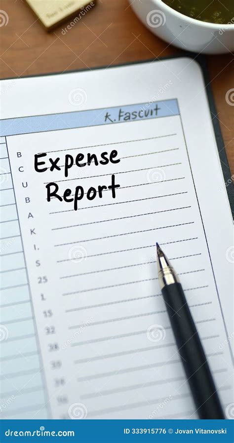 Expense Report With Pen And Glasses On Financial Document Stock