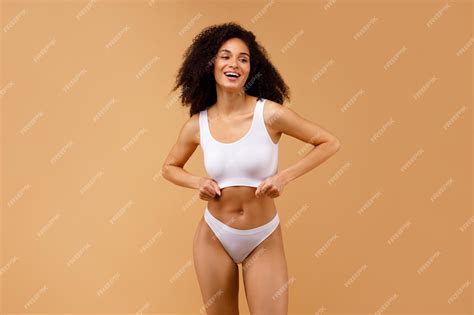 Slim African American Woman In White Underwear Top Bra And Panties